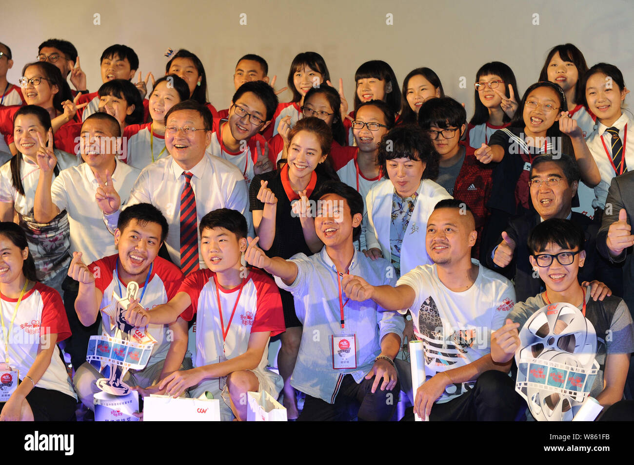 South Korean actress Cheon Seong-im, center, better known by her stage ...