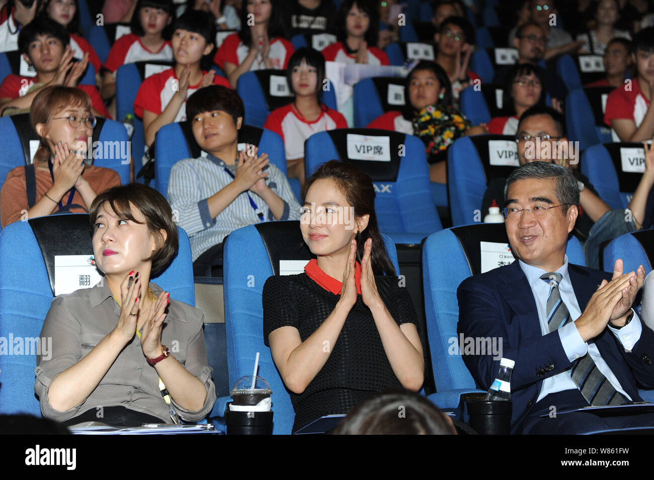 South Korean actress Cheon Seong-im, center, better known by her stage ...