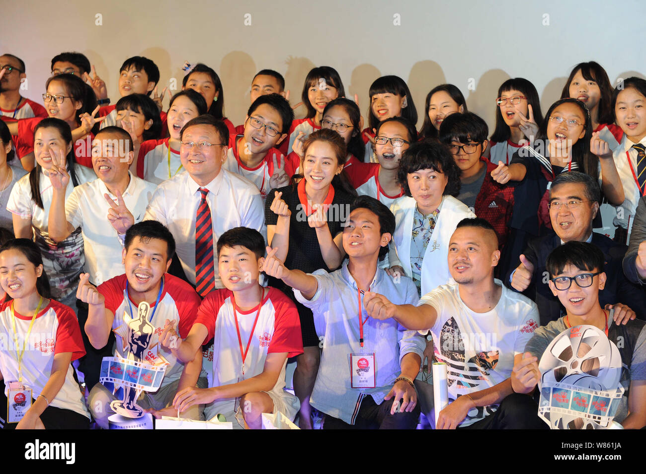 South Korean actress Cheon Seong-im, center, better known by her stage ...