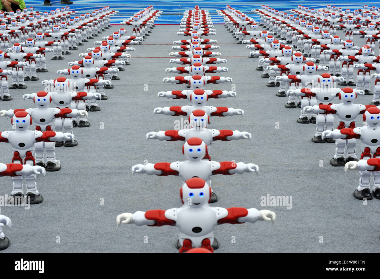 Robots dance during a challenge to set a new Guinness World Record for ...