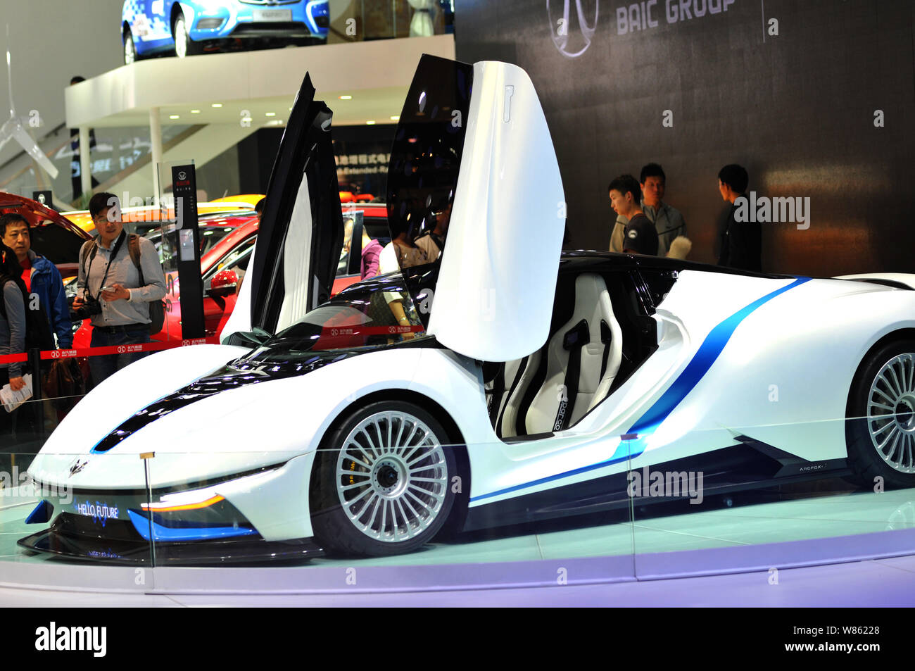--FILE--Visitors look at an ARCFOX-7 electric concept car of BAIC Group ...