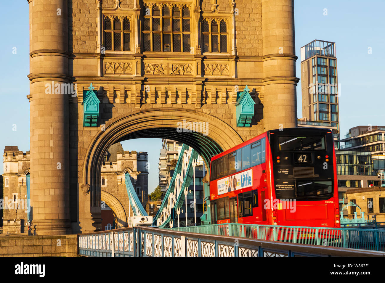 UK, London,Double Decker Bus crossing Tower Bridge Stock Photo - Alamy