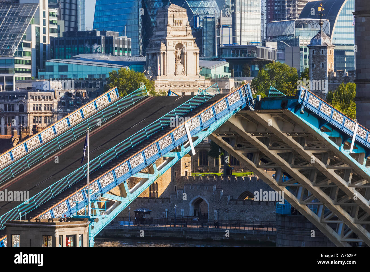 England, London, Tower Bridge, Close-up of Open Bridge and City Skyline ...
