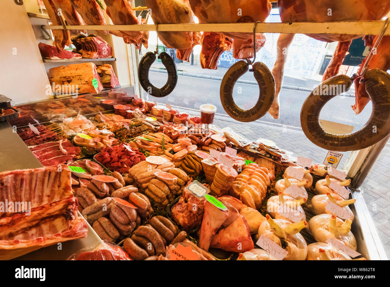 England, London, Deptford, Traditional Butchers Shop Window Display of ...