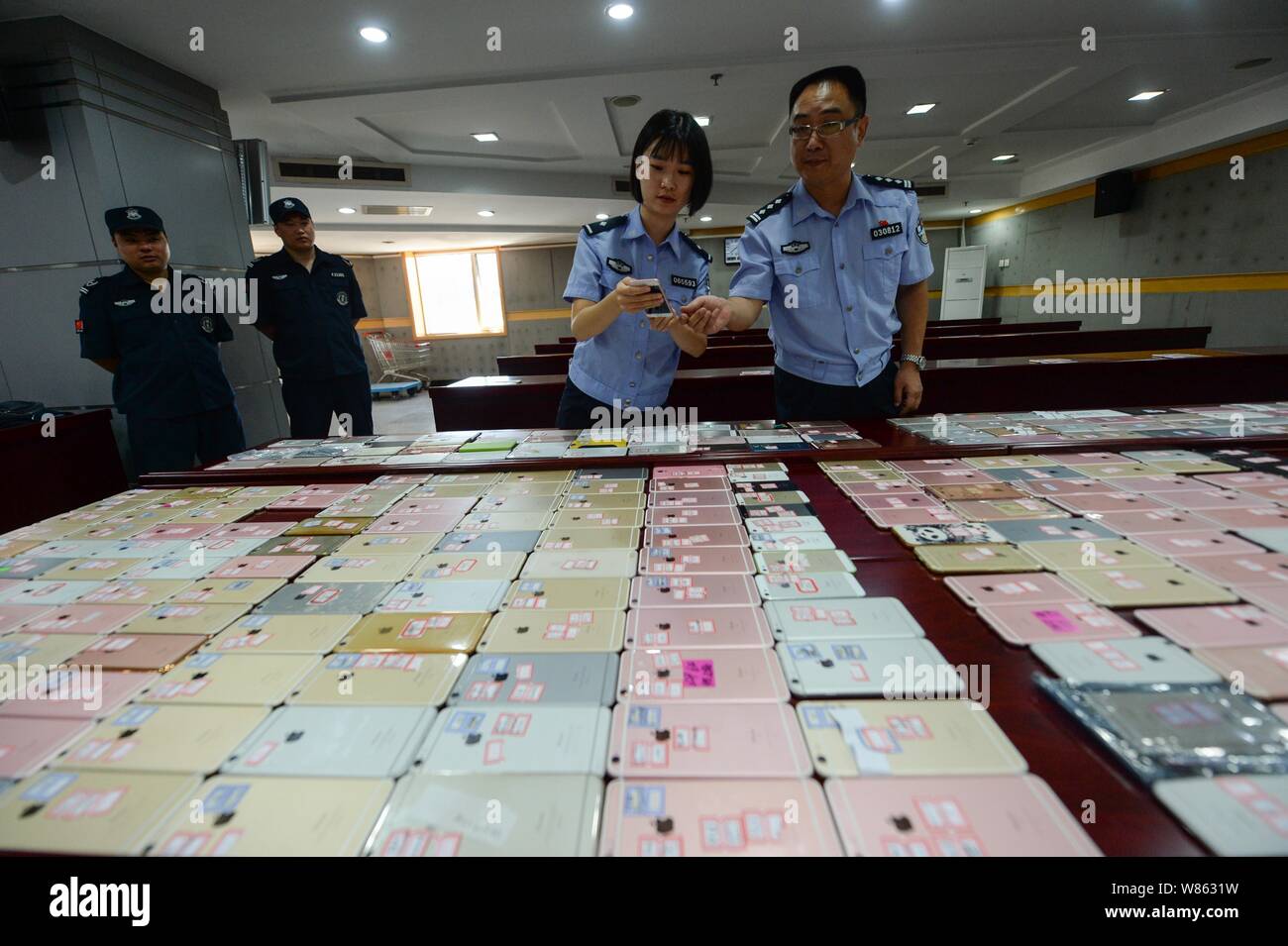 China police arresting hi-res stock photography and images - Alamy