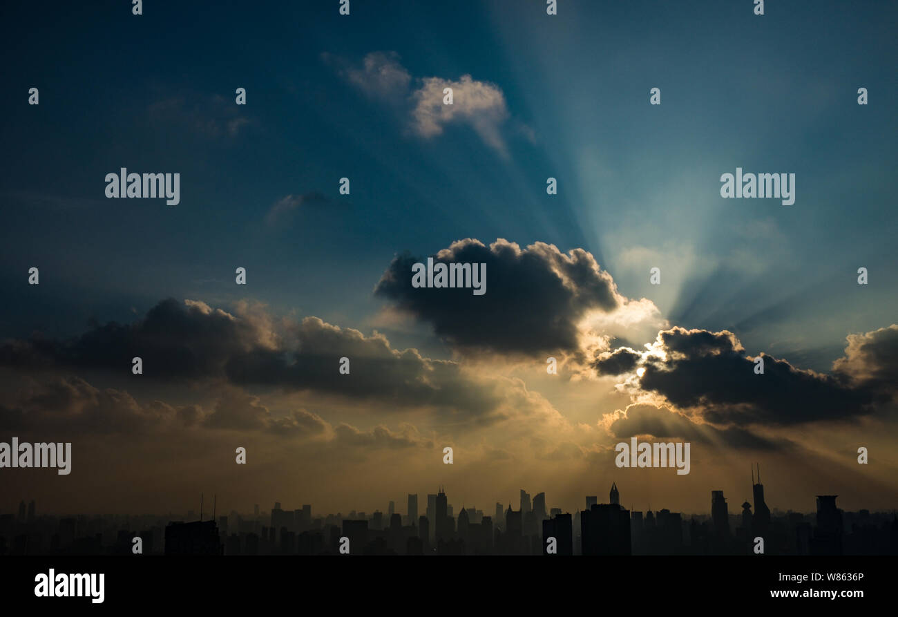 Skyline of Huangpu River and Puxi with high-rise buildings at sunset in ...
