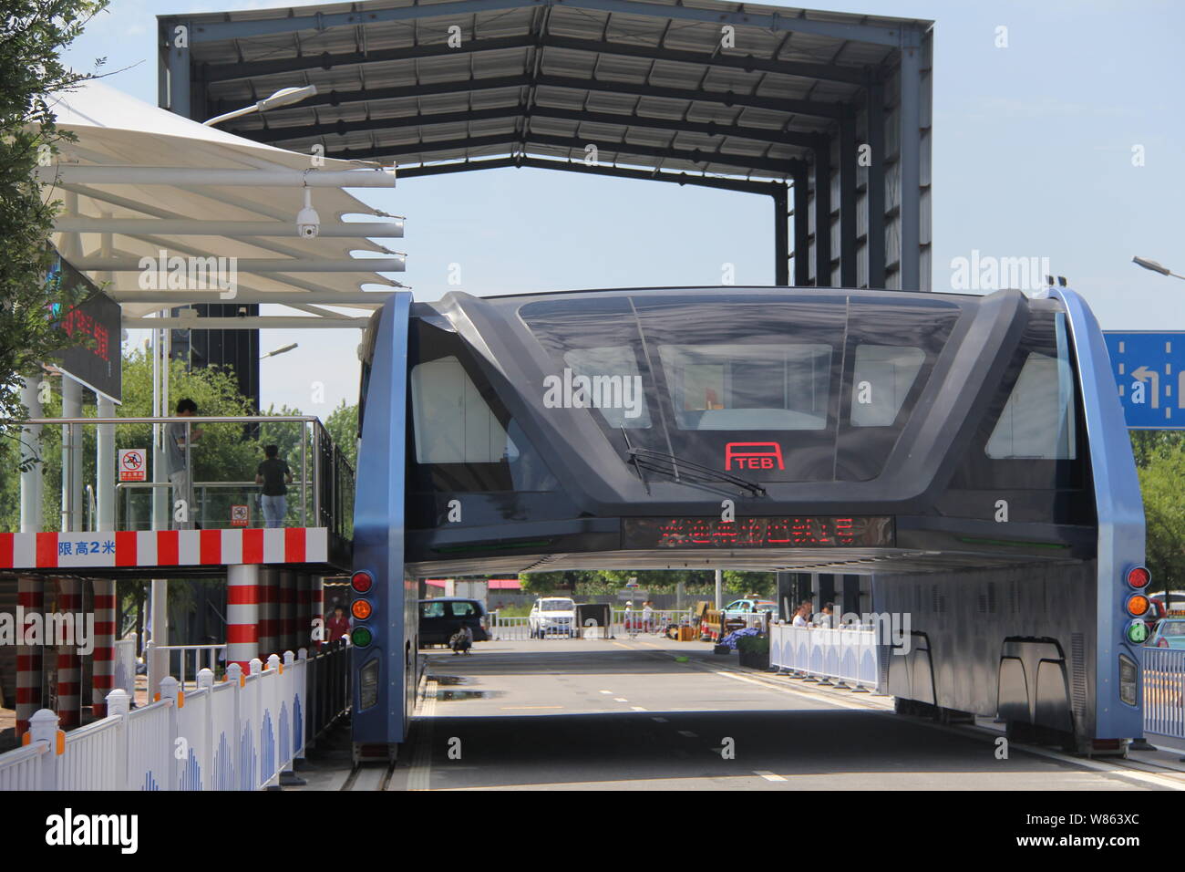 The Transit Elevated Bus (TEB) is pictured on Fumin road in Qinhuangdao city, north China's ...