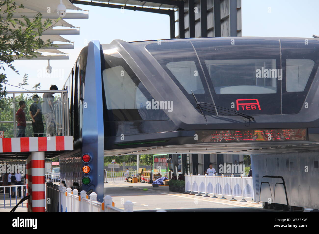 The Transit Elevated Bus (TEB) is pictured on Fumin road in Qinhuangdao city, north China's ...