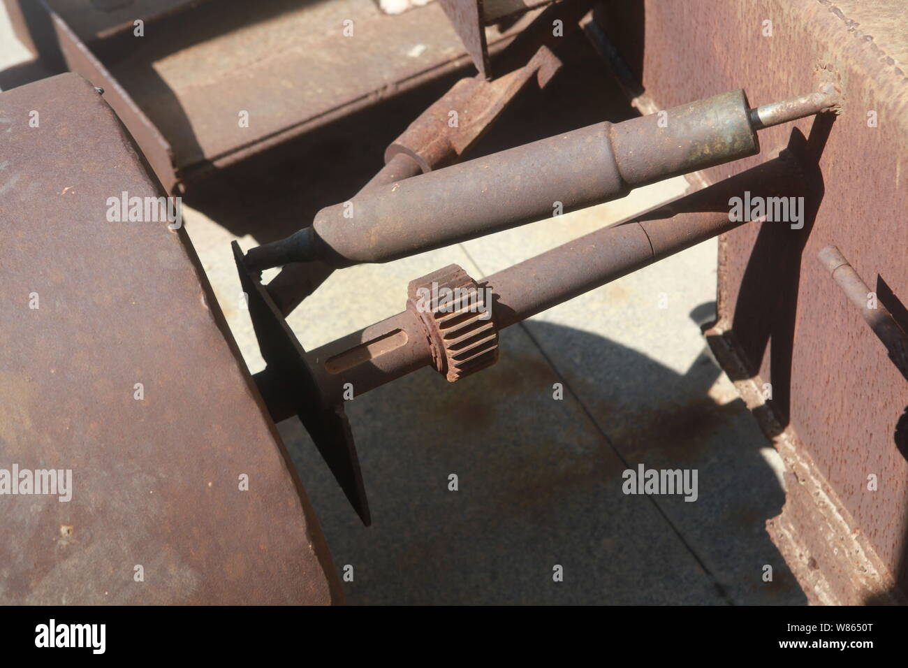 A view of details of a homemade F1 race car built out of scrap iron on display outside a store ...
