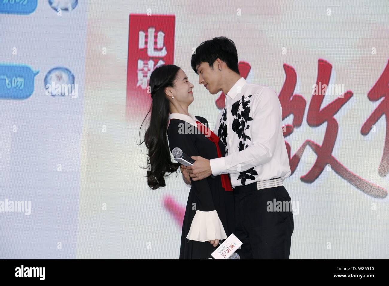 Hong Kong model and actress Angelababy, left, and Chinese actor Jing ...