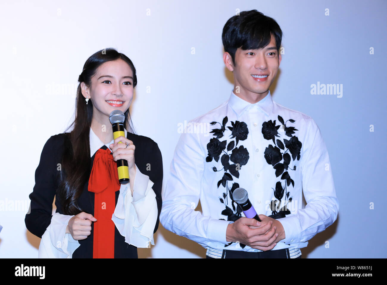 Hong Kong model and actress Angelababy, left, and Chinese actor Jing ...