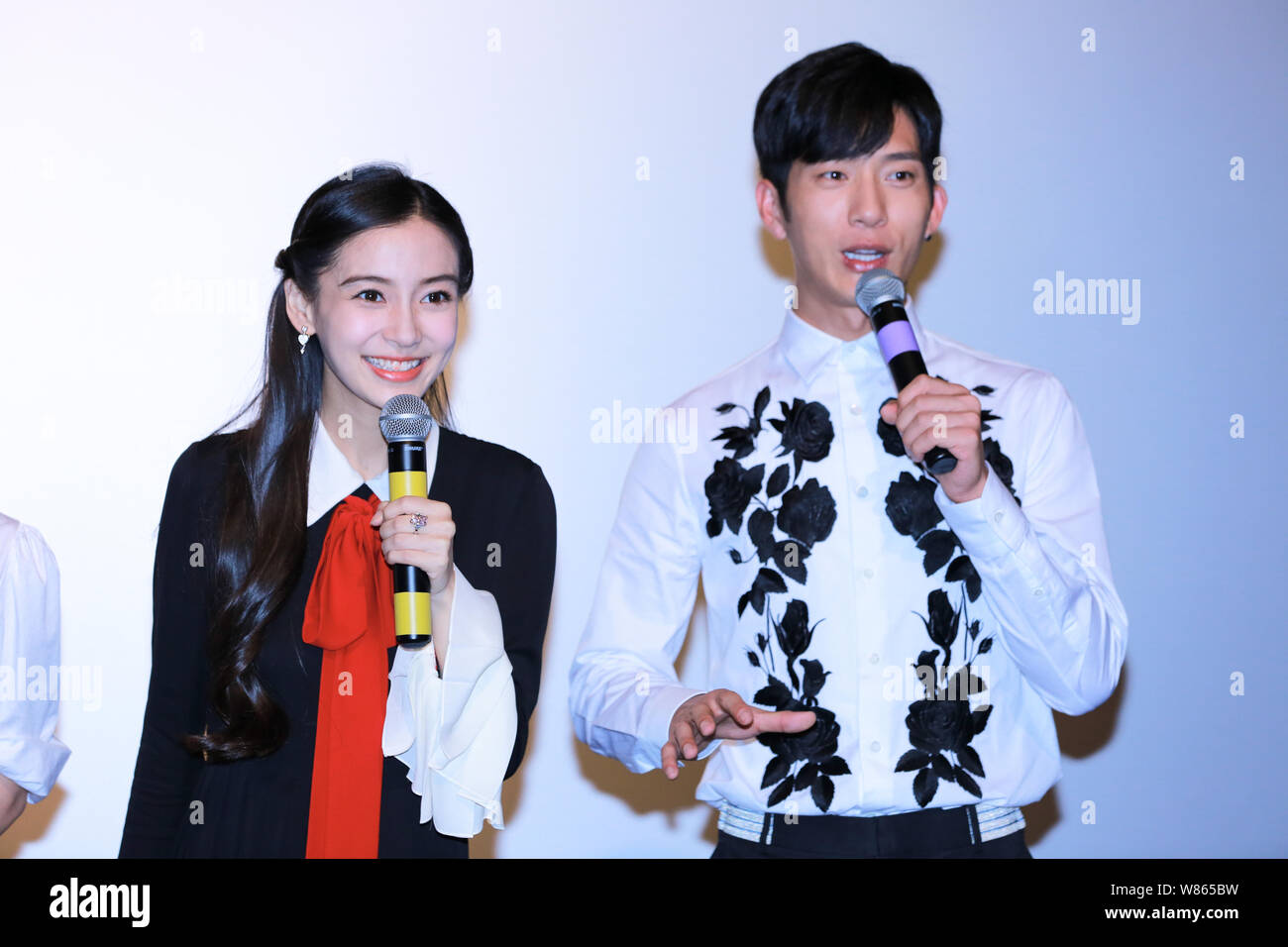 Hong Kong model and actress Angelababy, left, and Chinese actor Jing ...