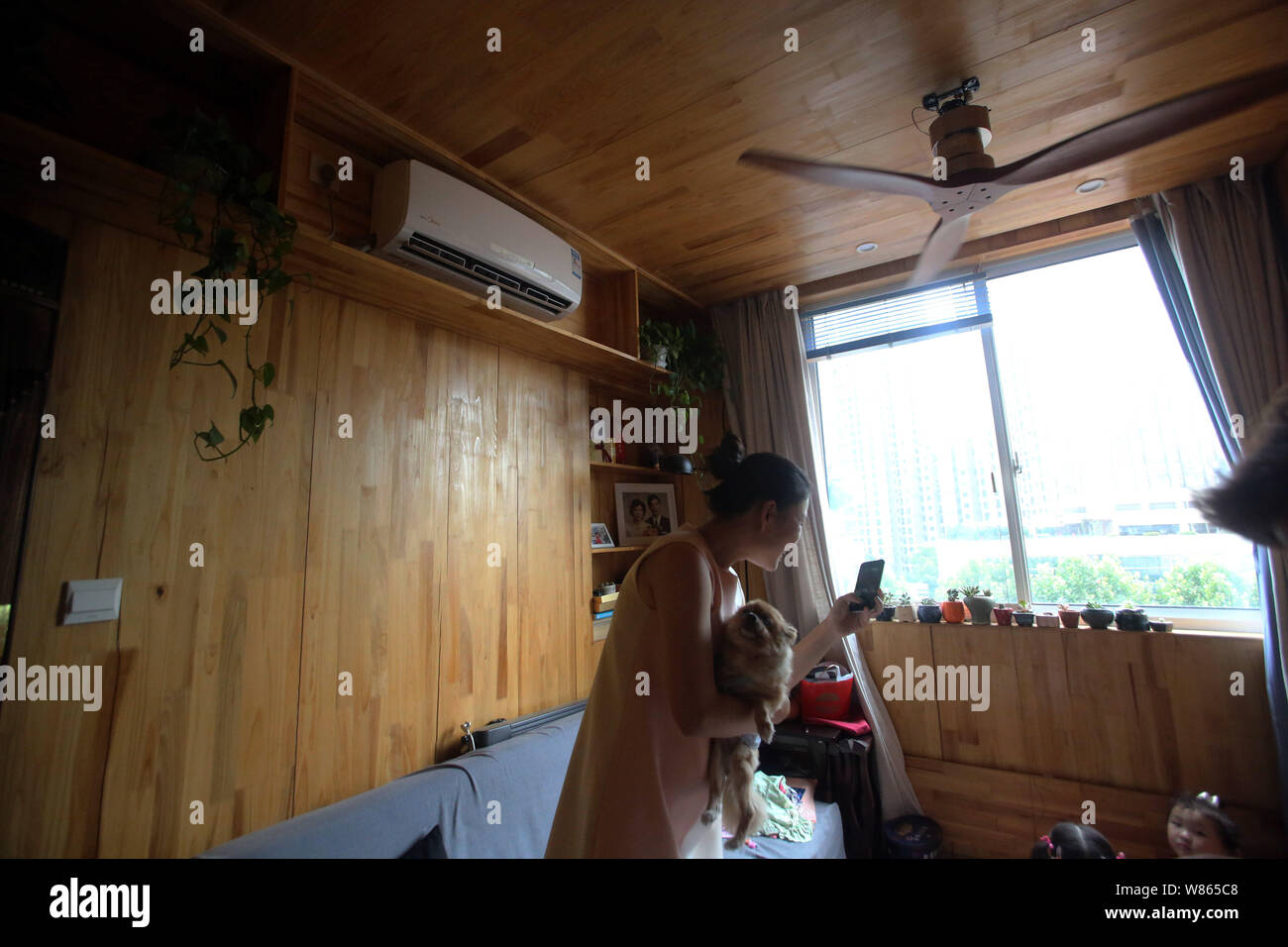 Interior view of the living room of a renovated 39-square-meters house ...