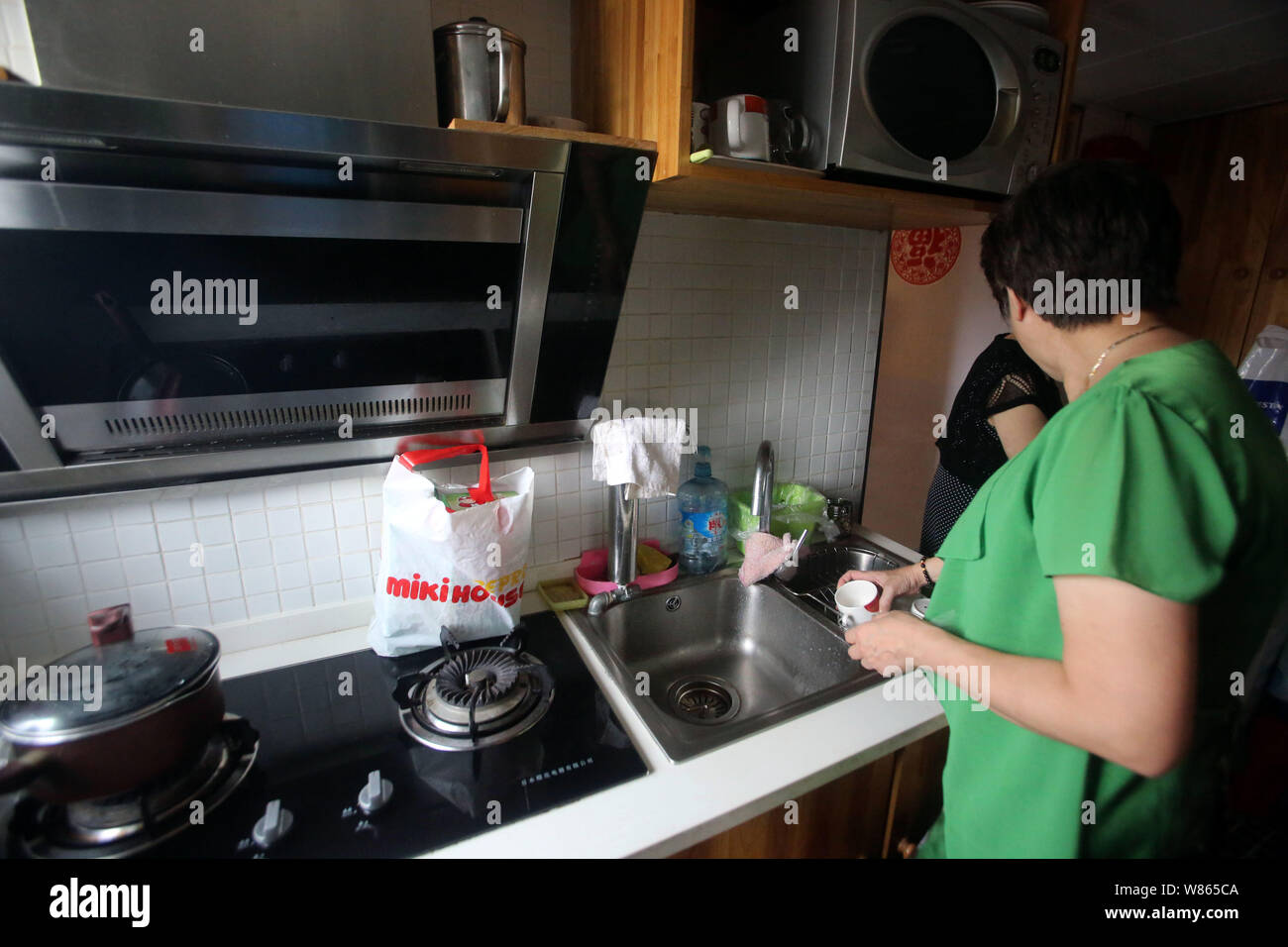 Interior view of the kitchen of a renovated 39-square-meters house in ...