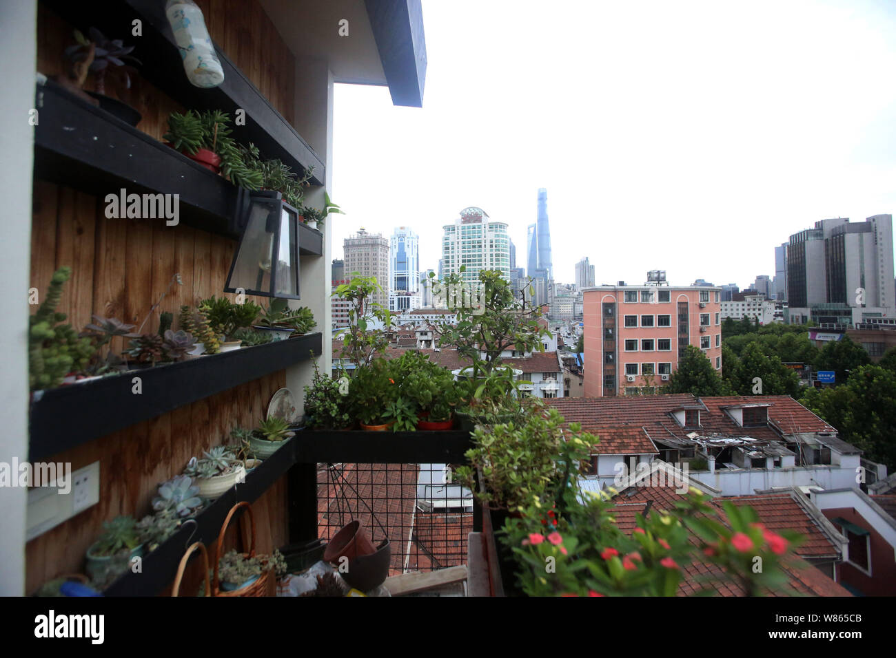 Interior view of the balcony of a renovated 39-square-meters house in ...