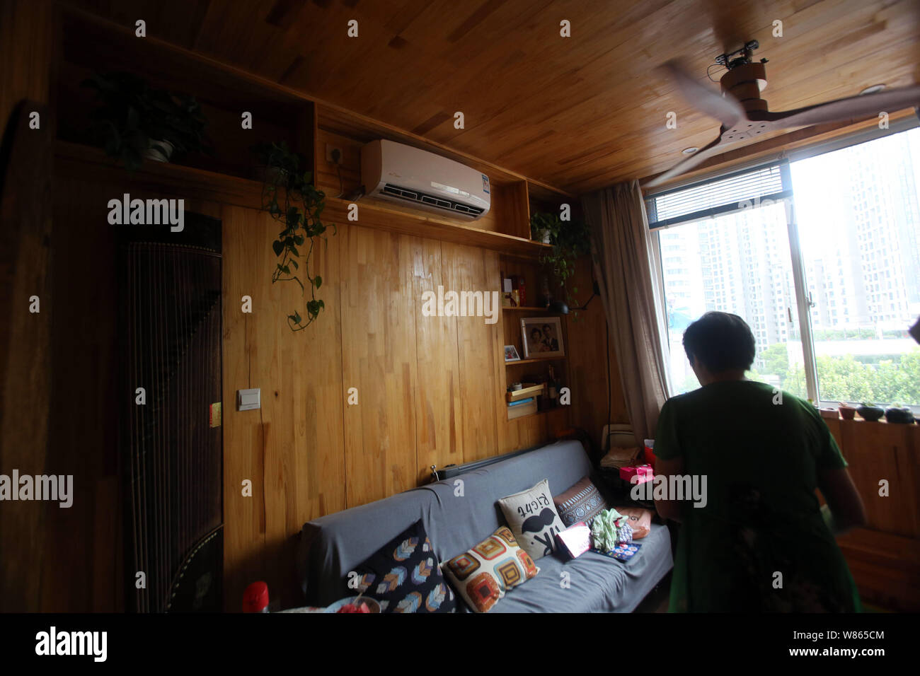 Interior view of the living room of a renovated 39-square-meters house ...