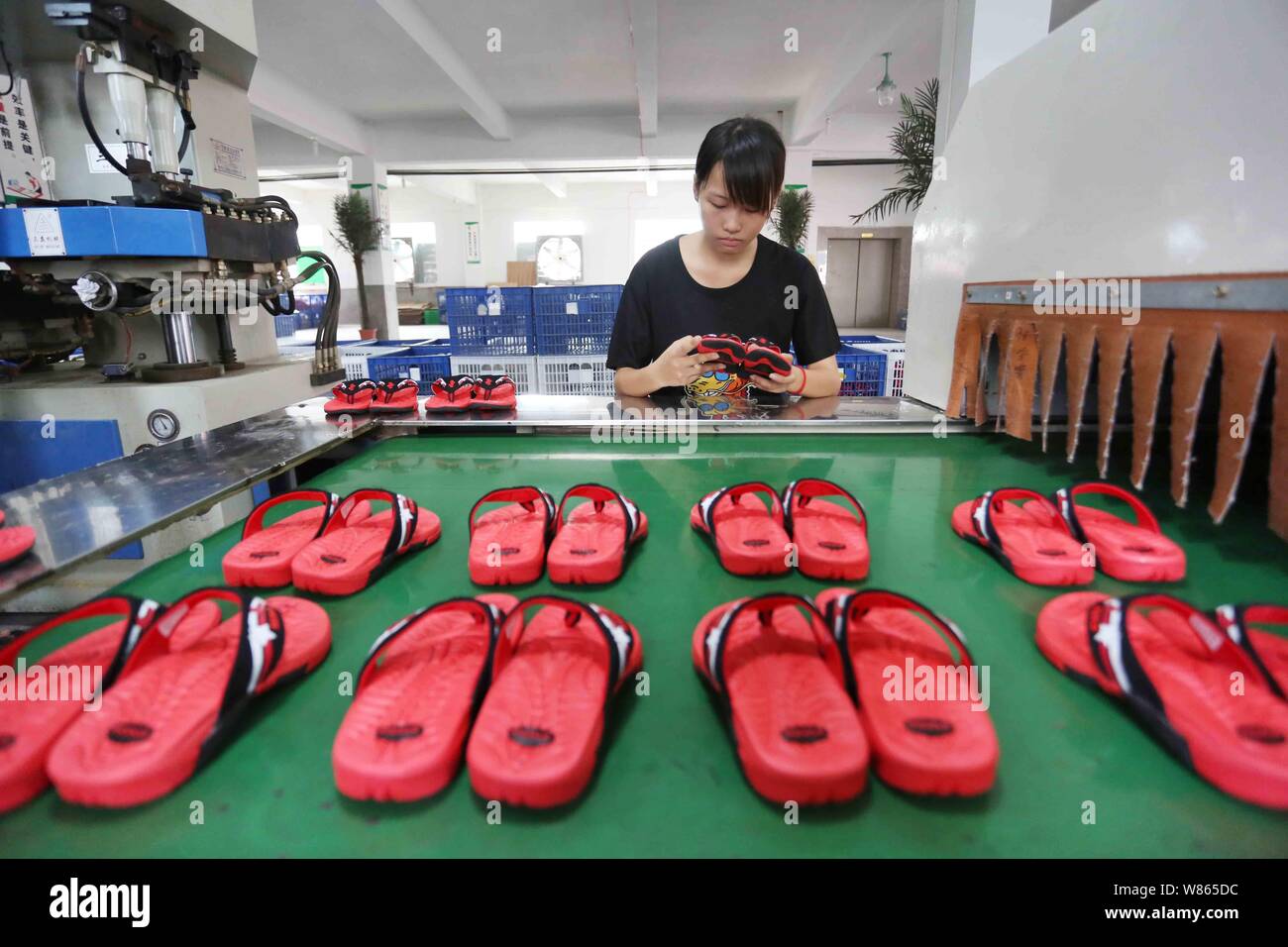 Chinese slippers hi-res stock photography and images - Alamy