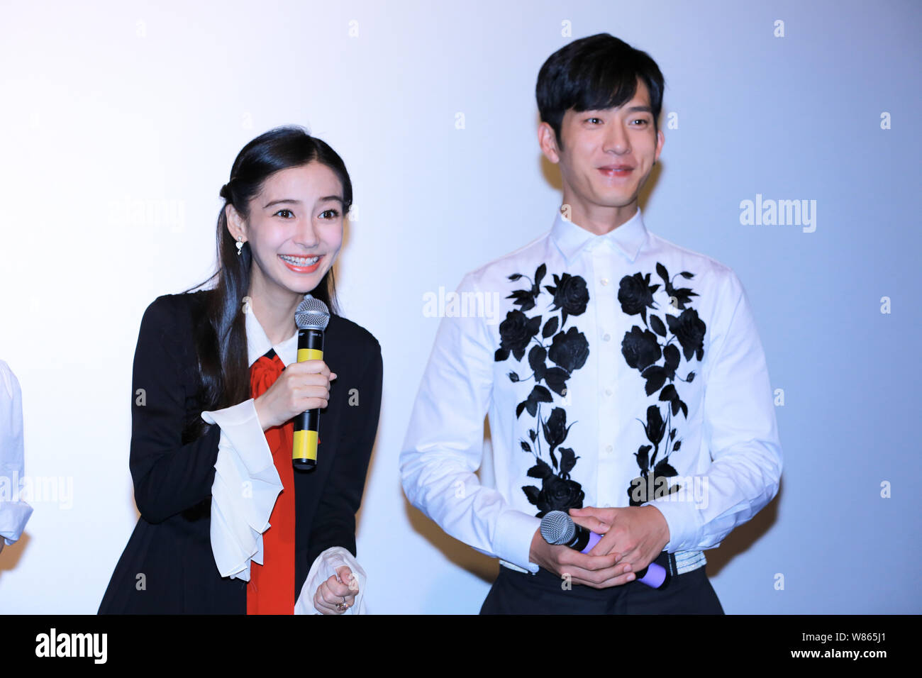Hong Kong model and actress Angelababy, left, and Chinese actor Jing ...