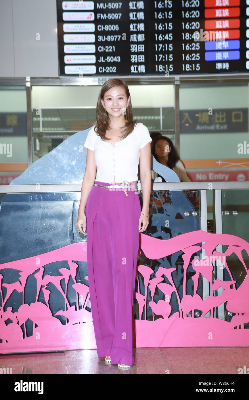 Japanese singer and actress Chiaki Ito of Japanese pop group AAA poses after landing at Taipei ...