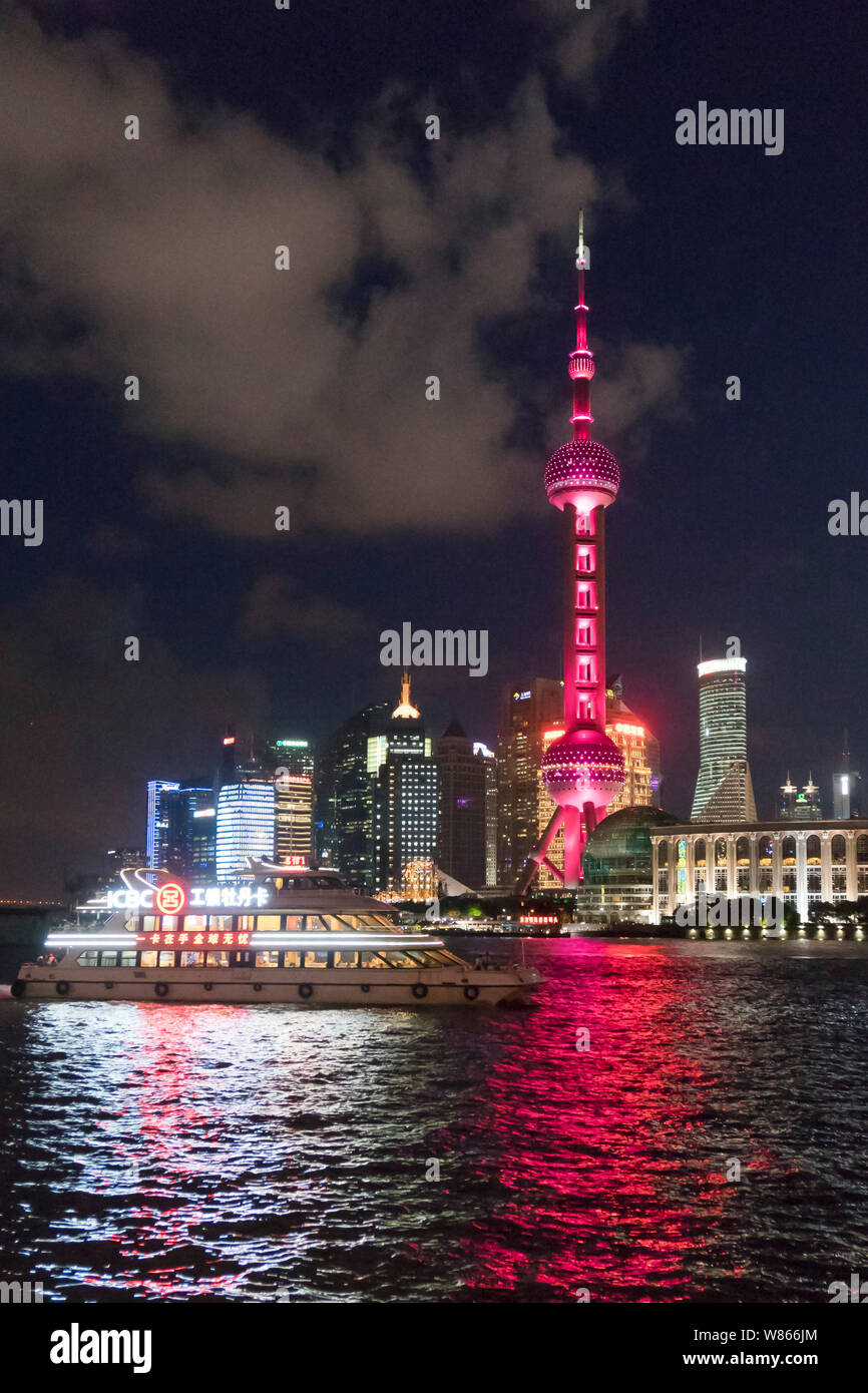The Oriental Pearl TV Tower is illuminated in red to celebrate Shanghai ...