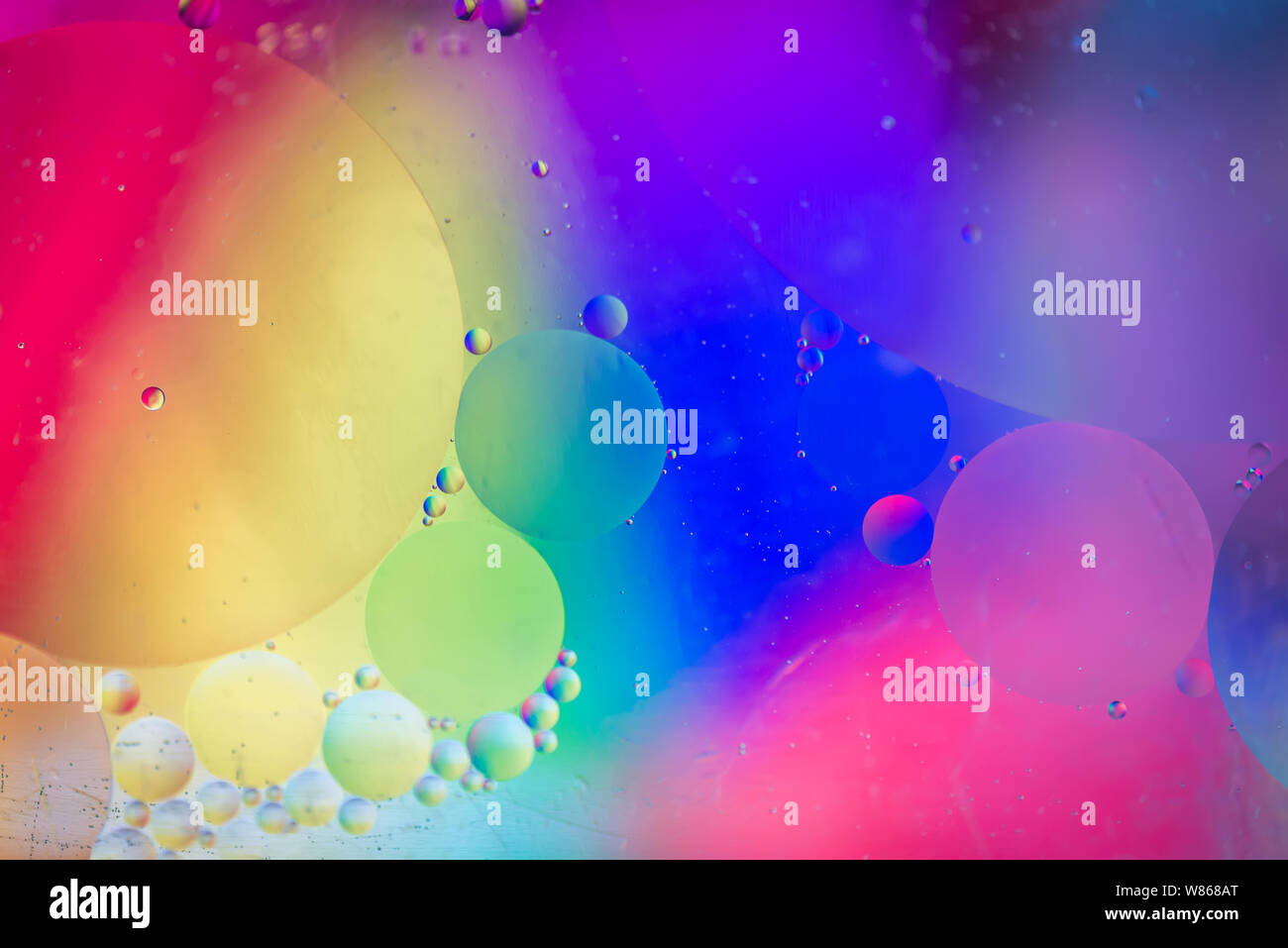 Oil drops in water. Abstract psychedelic pattern image rainbow colored ...