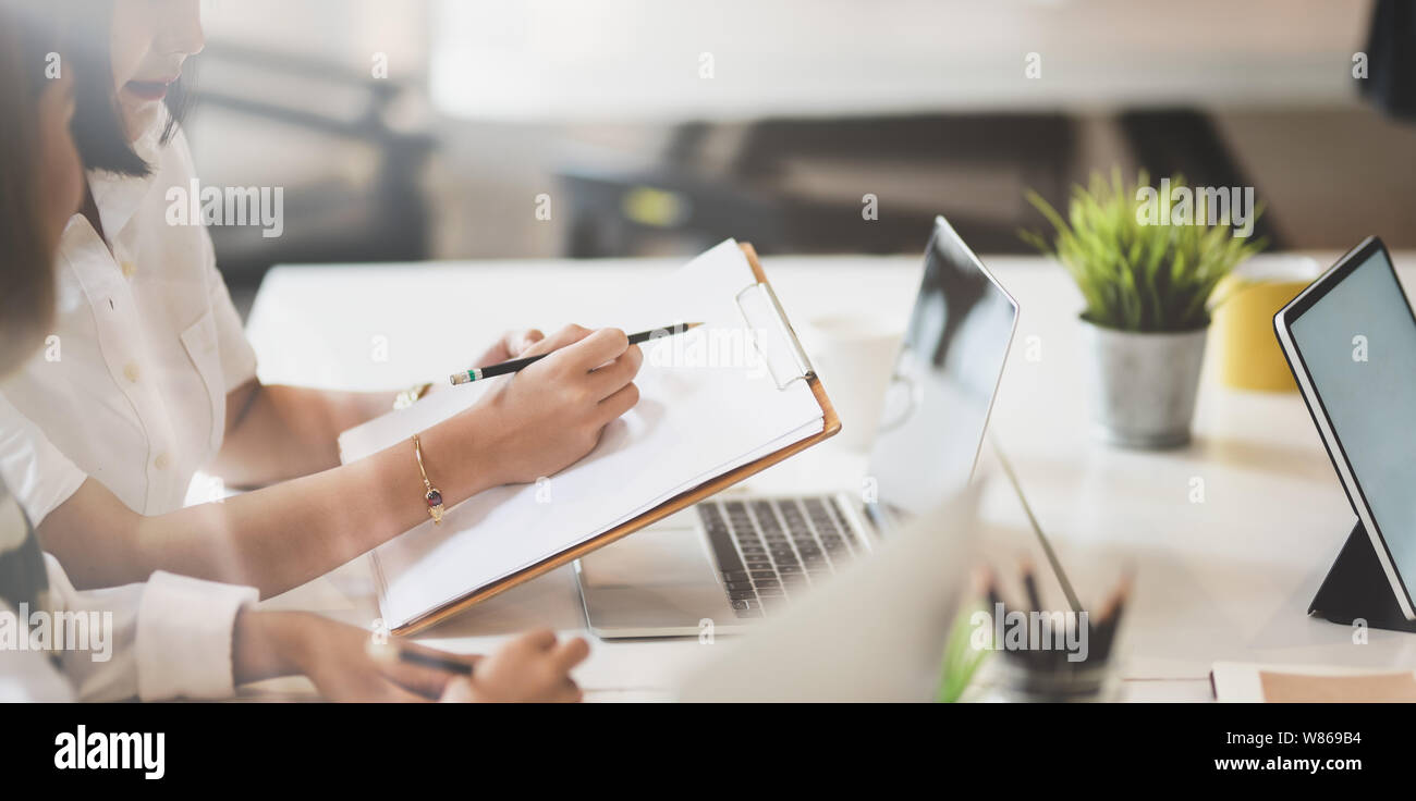 Professional business partner consulting the strategy together for the ...