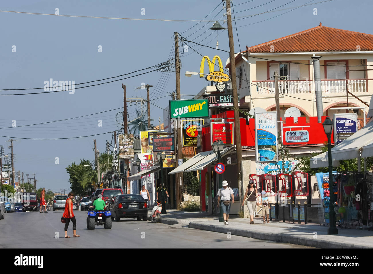 LAGANAS - OCTOBER 3 : A main street in the village Laganas on October 3 ...