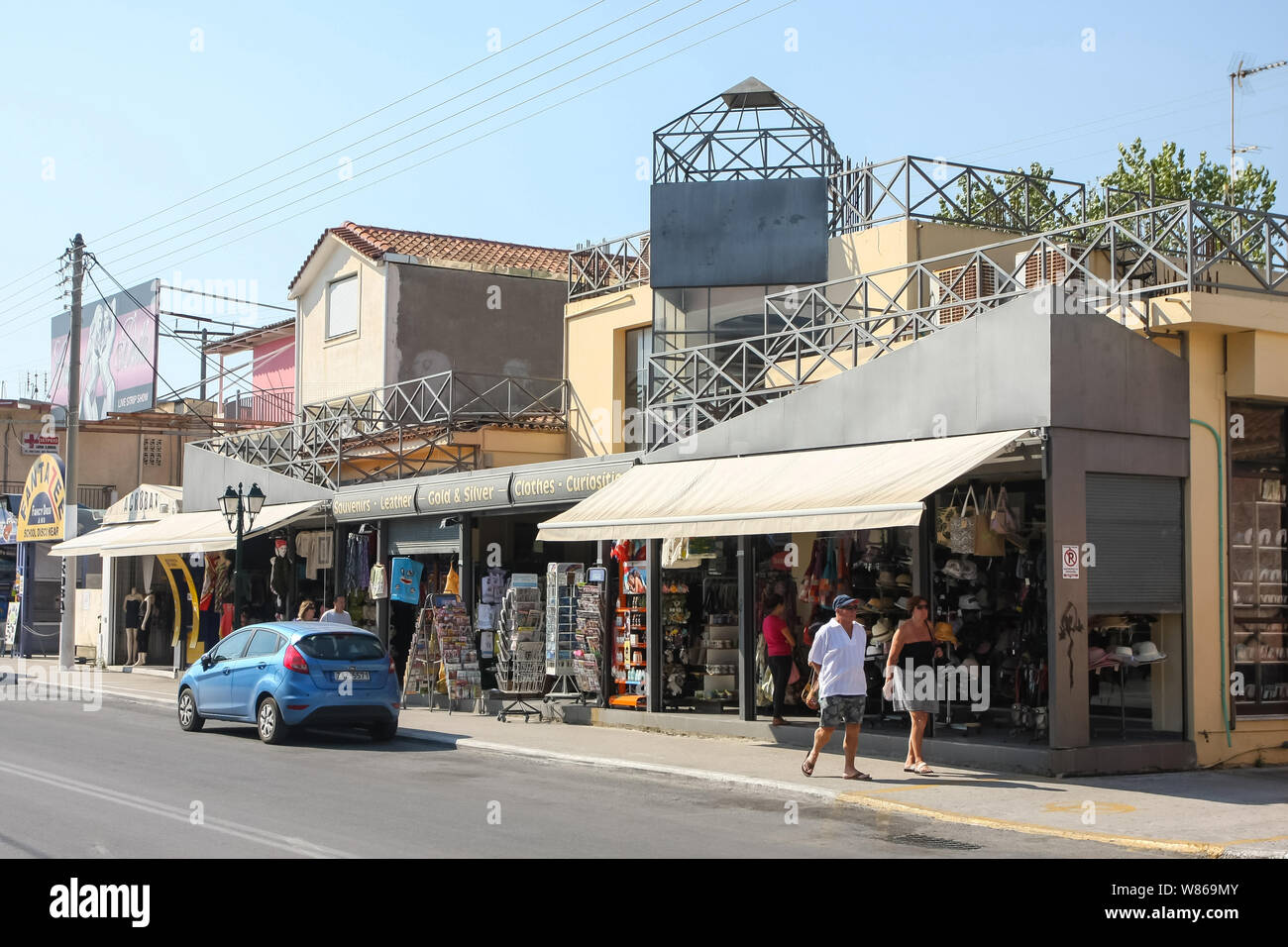 LAGANAS - OCTOBER 3 : A main street in the village Laganas on October 3 ...