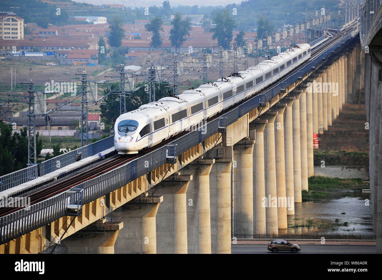 --FILE--A CRH (China Railway High-speed) bullet train travels on the ...