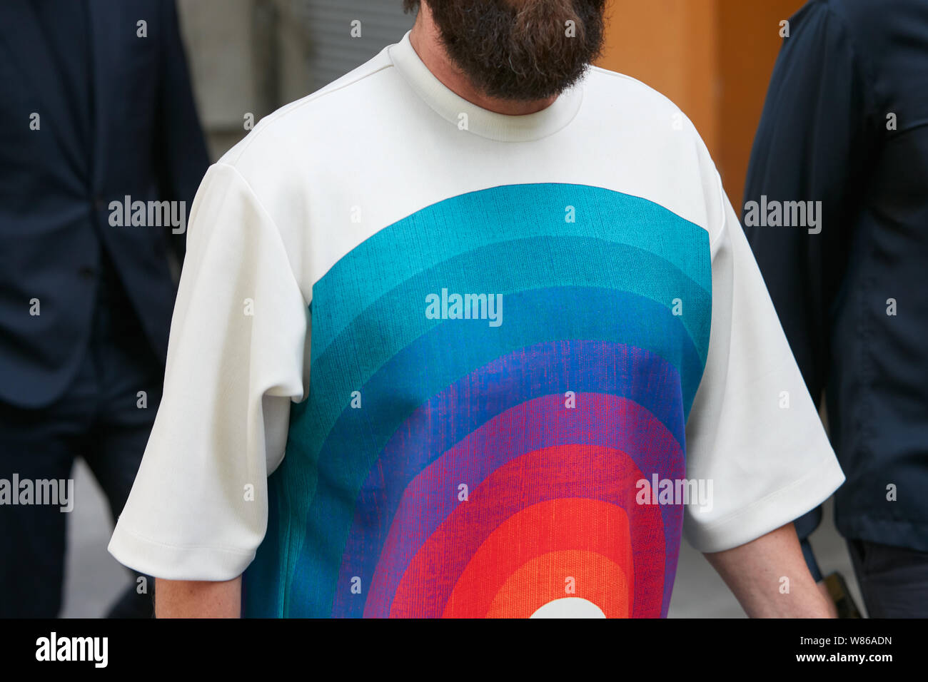 MILAN, ITALY - JUNE 15, 2019: Man with beard and white shirt with blue ...