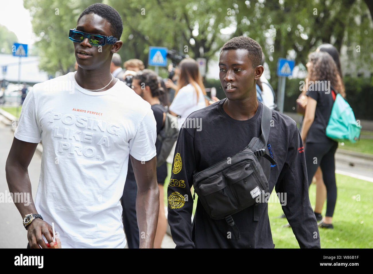 MILAN, ITALY - JUNE 15, 2019: Models after Emporio Armani fashion show ...