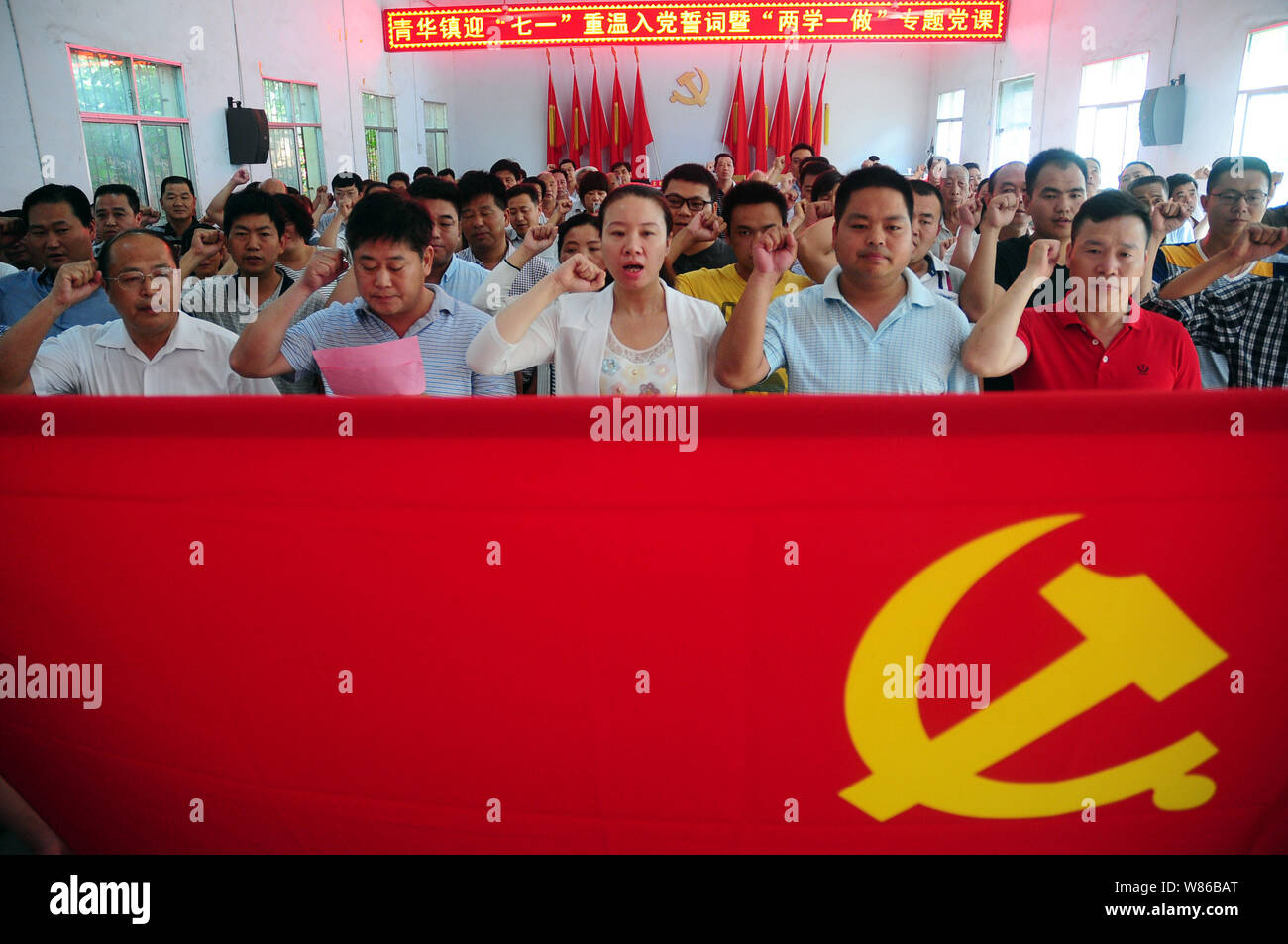 Chinese cpc members swear in hi-res stock photography and images - Alamy