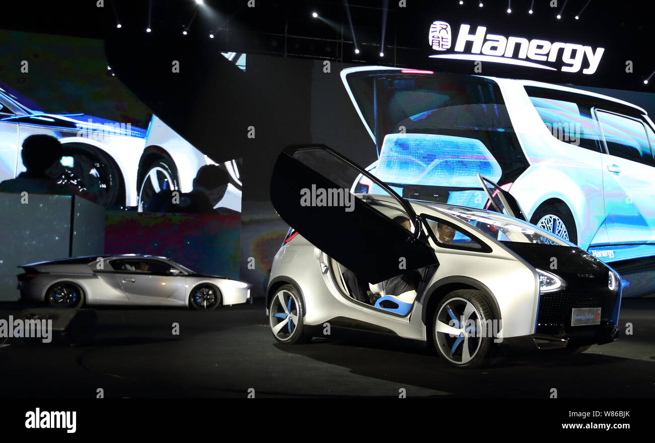 Hanergy solar-powered cars are on display at a launch event in Beijing ...
