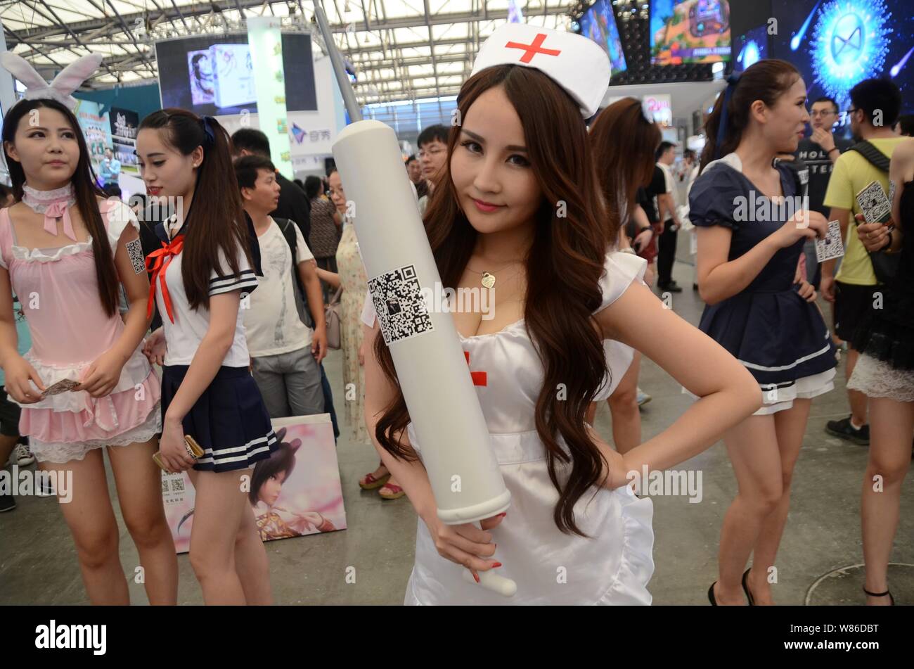 --FILE--A scantily-dressed showgirl poses during the 13th China Digital Entertainment Expo, also ...