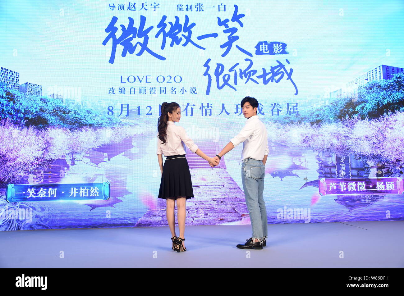 Hong Kong model and actress Angelababy, left, and Chinese actor Jing ...