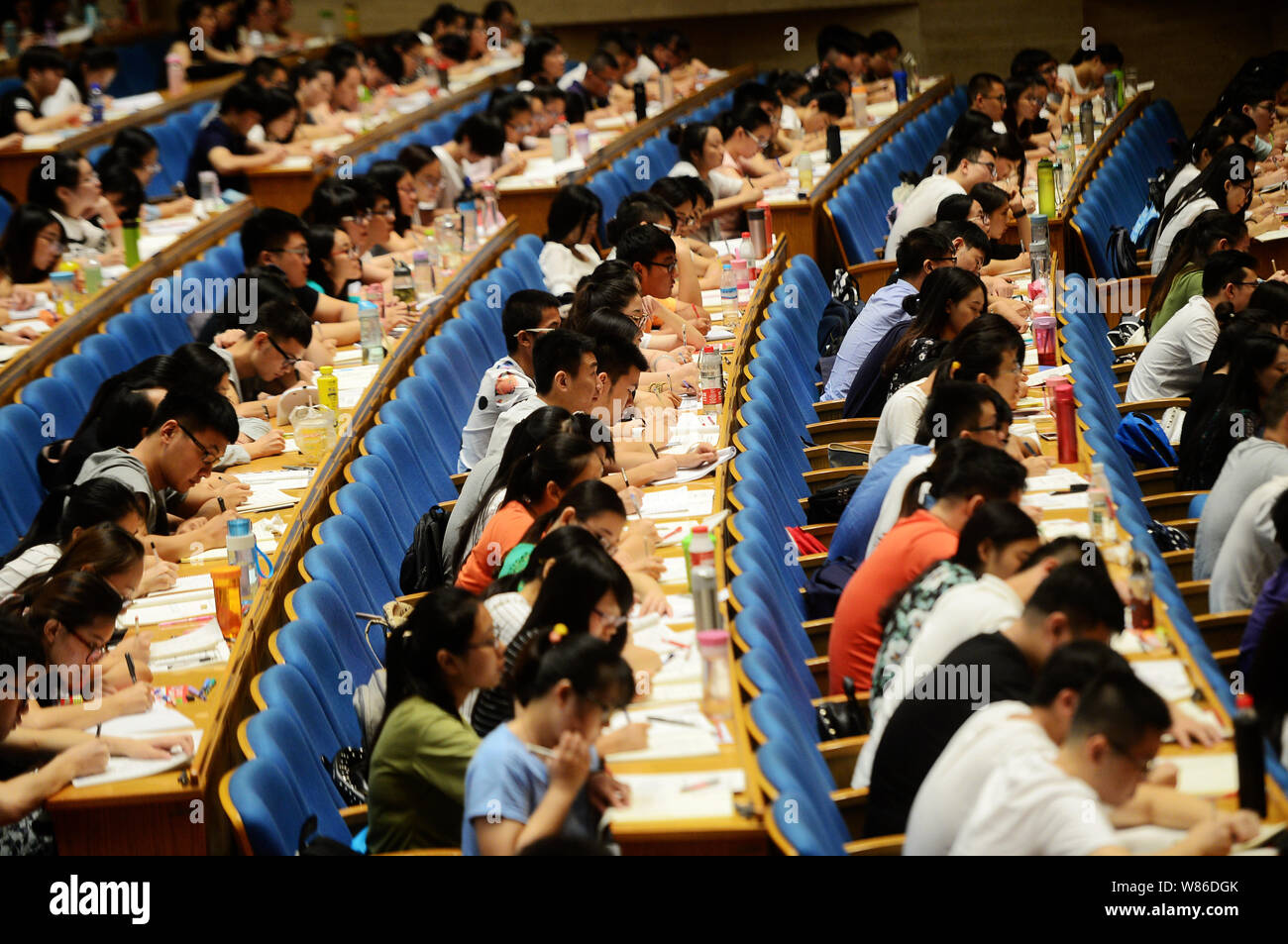 Chinese students take part in a tutorial and review session for the ...