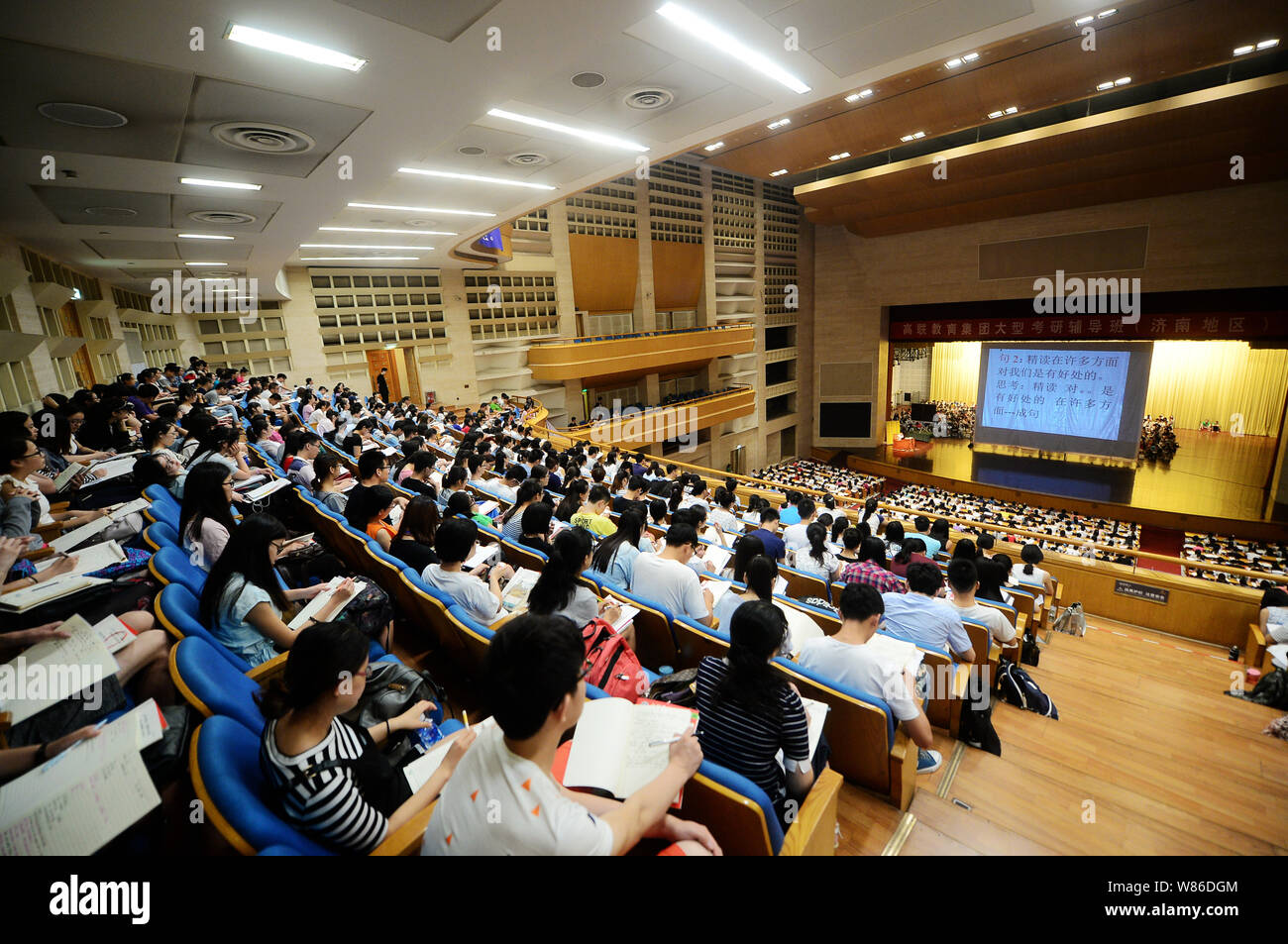 Chinese students take part in a tutorial and review session for the ...