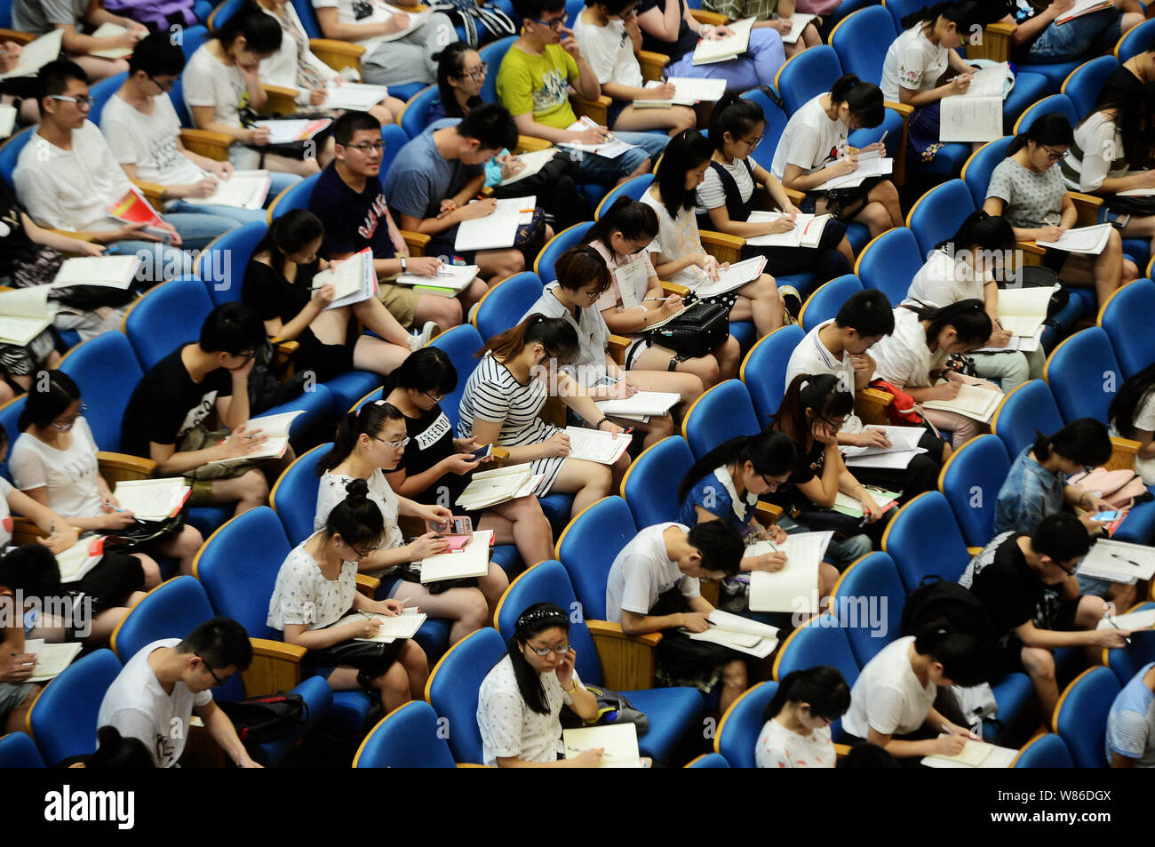 Chinese students take part in a tutorial and review session for the ...