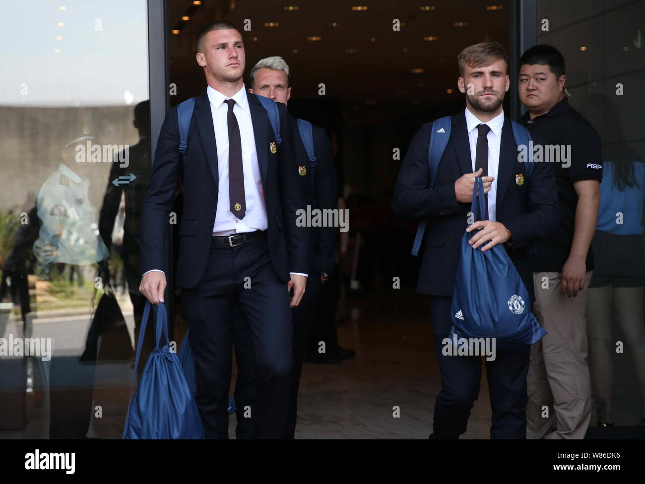 Sam Johnstone, left, and Luke Shaw, right, of Manchester United F.C ...