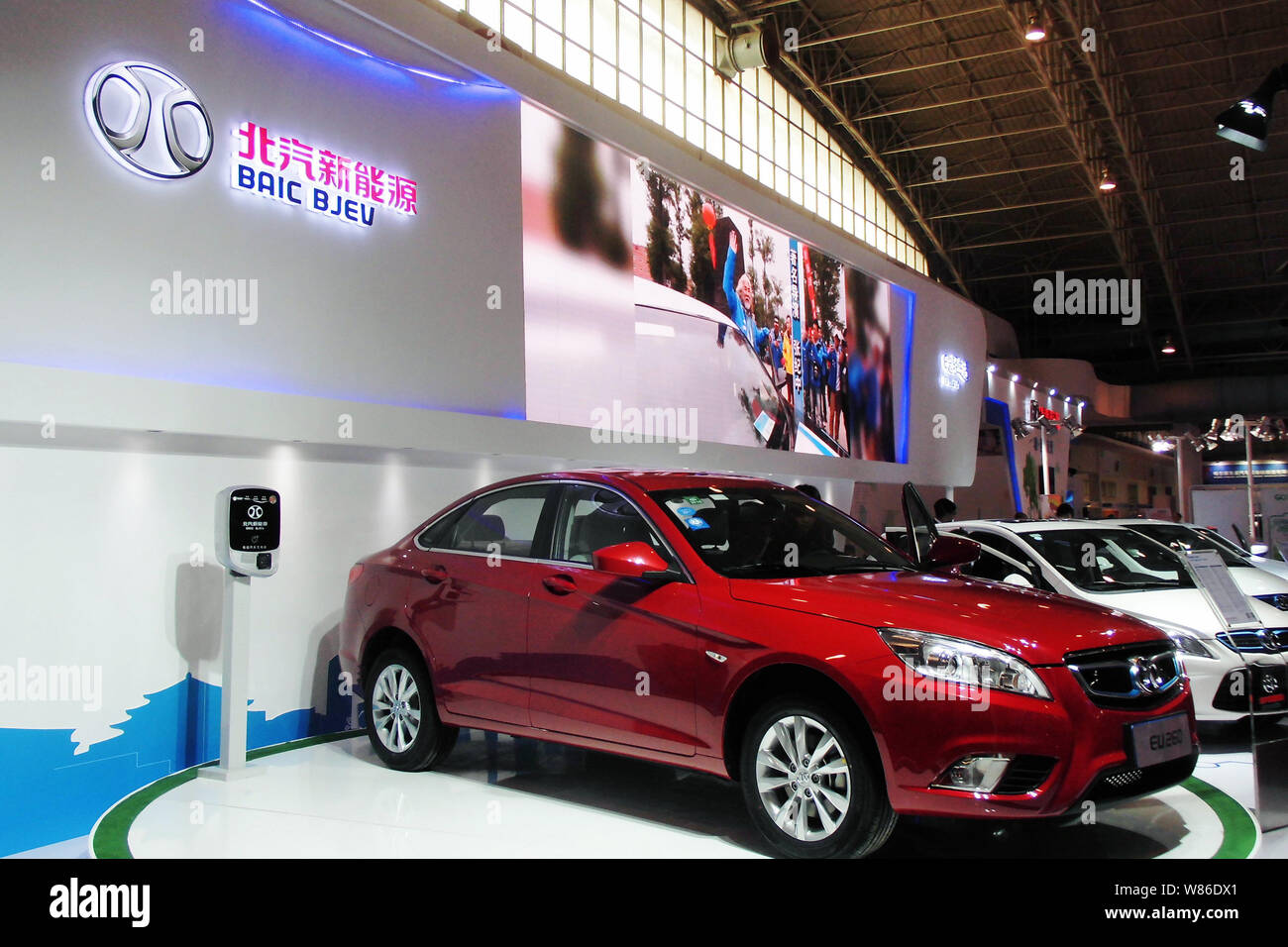 --FILE--Cars are on display at the stand of BAIC BJEV during the 14th ...