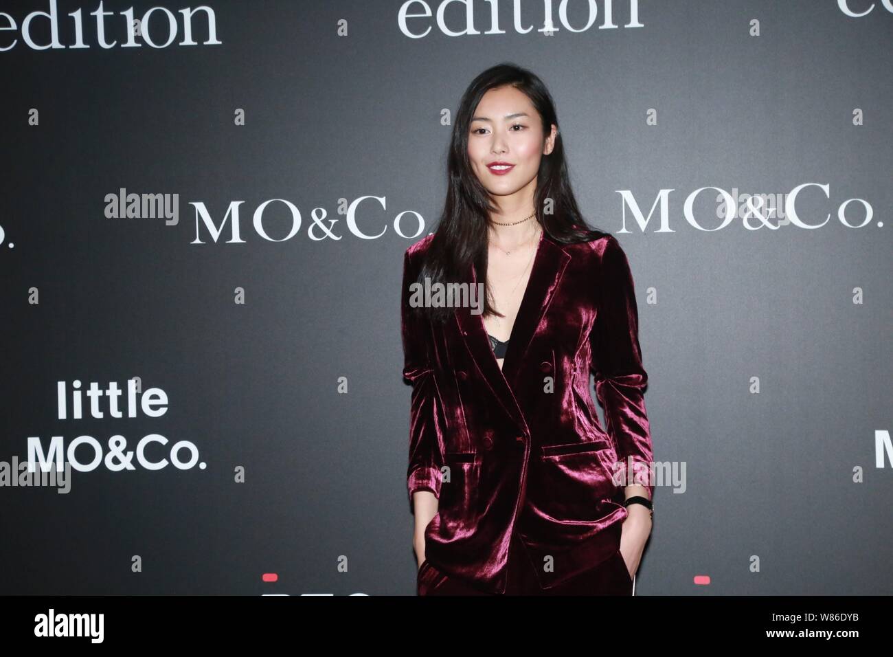 Chinese super model Liu Wen poses at a fashion show of "MO&Co in ...