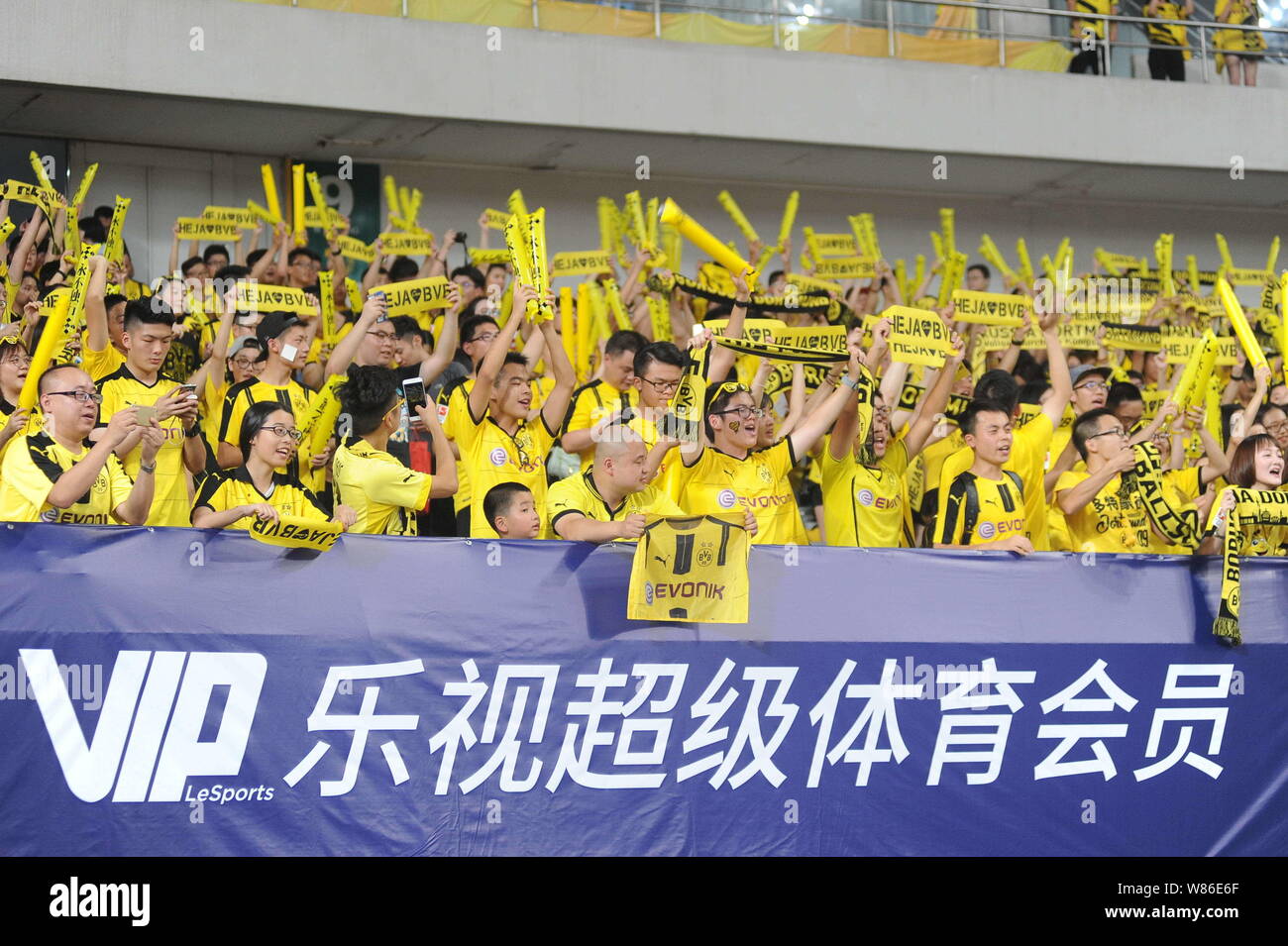 Chinese football fans of Borussia Dortmund watch the Shanghai match ...
