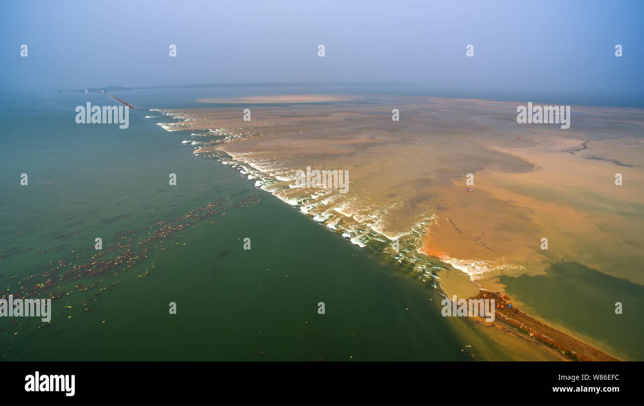Aerial view of the dike separating Liangzi Lake and Niushan Lake after ...