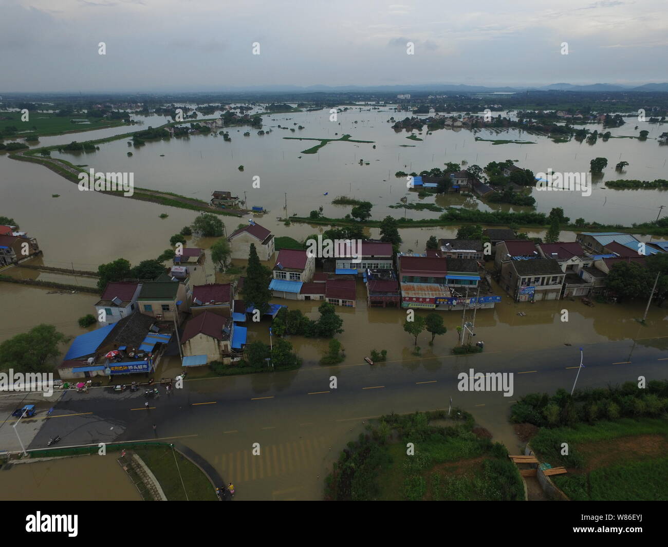 Aerial view of houses half-submerged in flood waters caused by ...