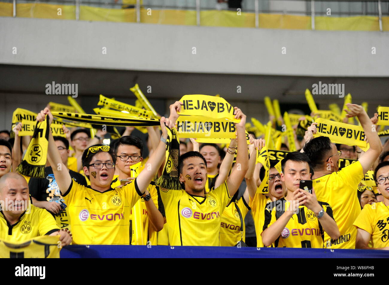 Chinese football fans of Borussia Dortmund watch the Shanghai match ...