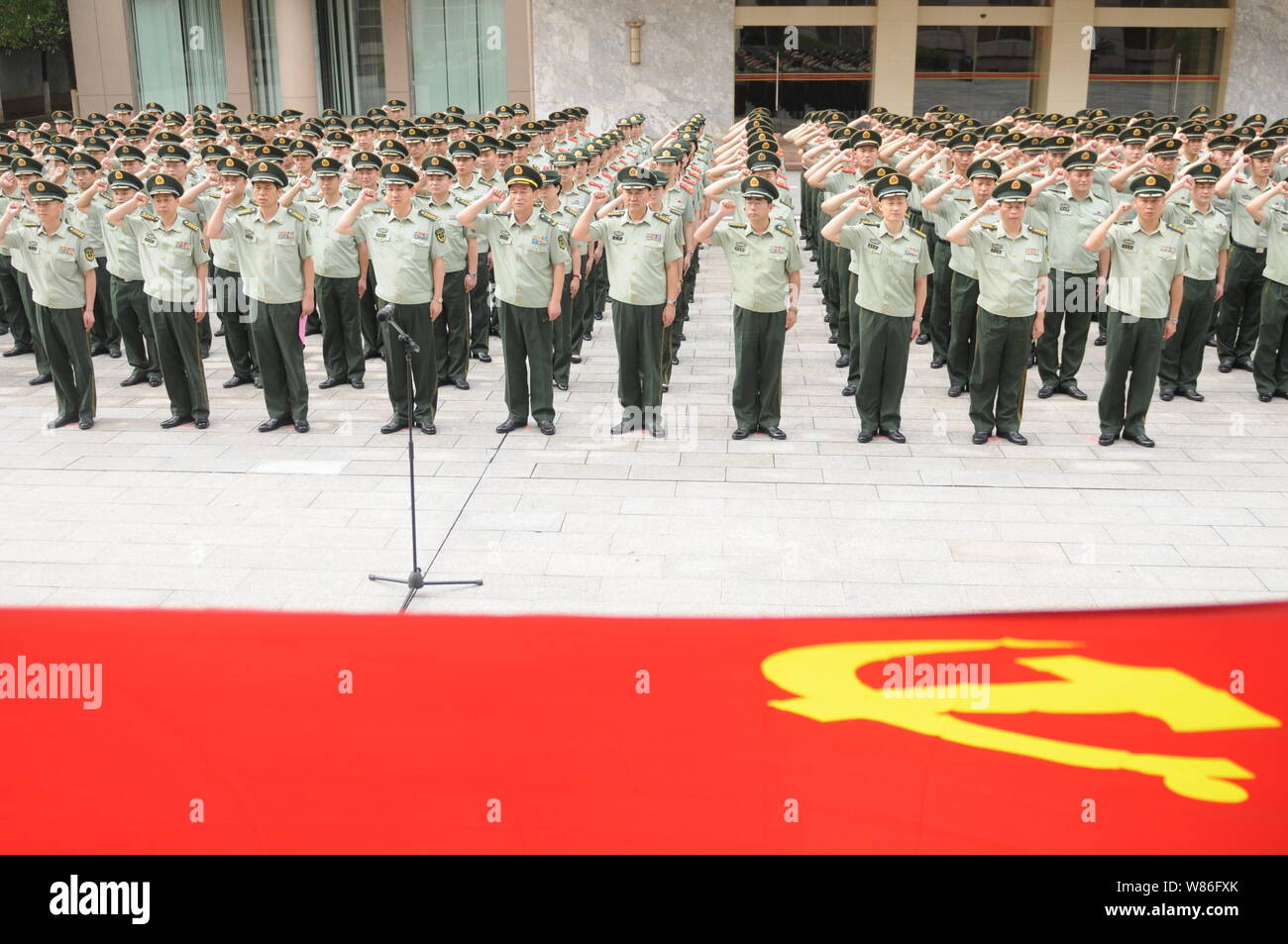 Chinese paramilitary policemen, also members of the Communist Party of ...