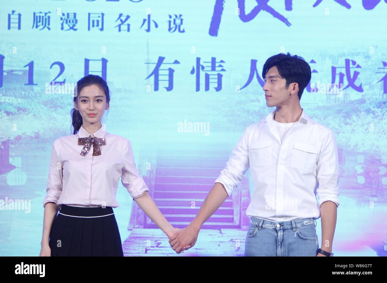 Hong Kong model and actress Angelababy, left, and Chinese actor Jing ...