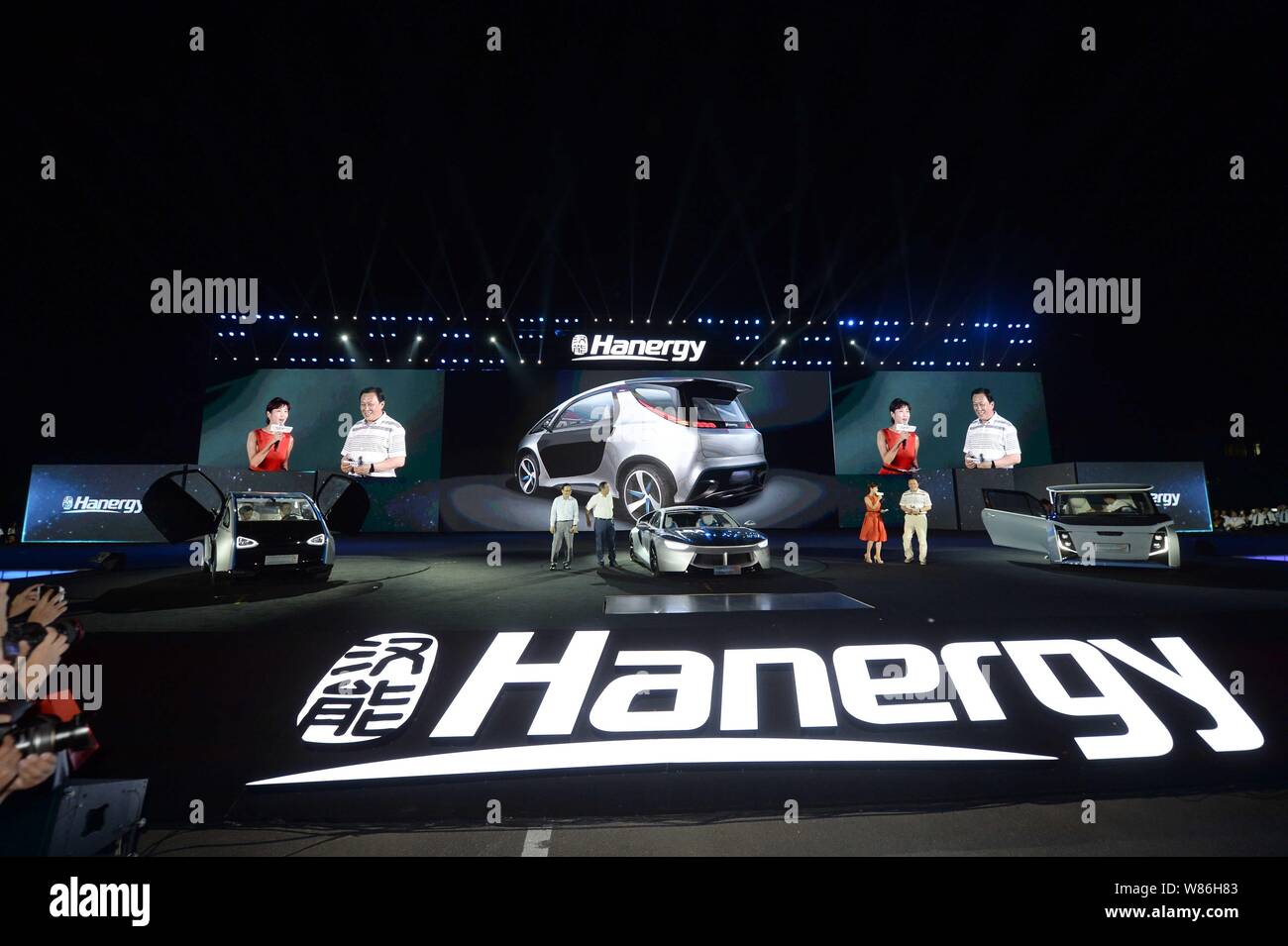 Hanergy solar-powered cars are on display at a launch event in Beijing ...