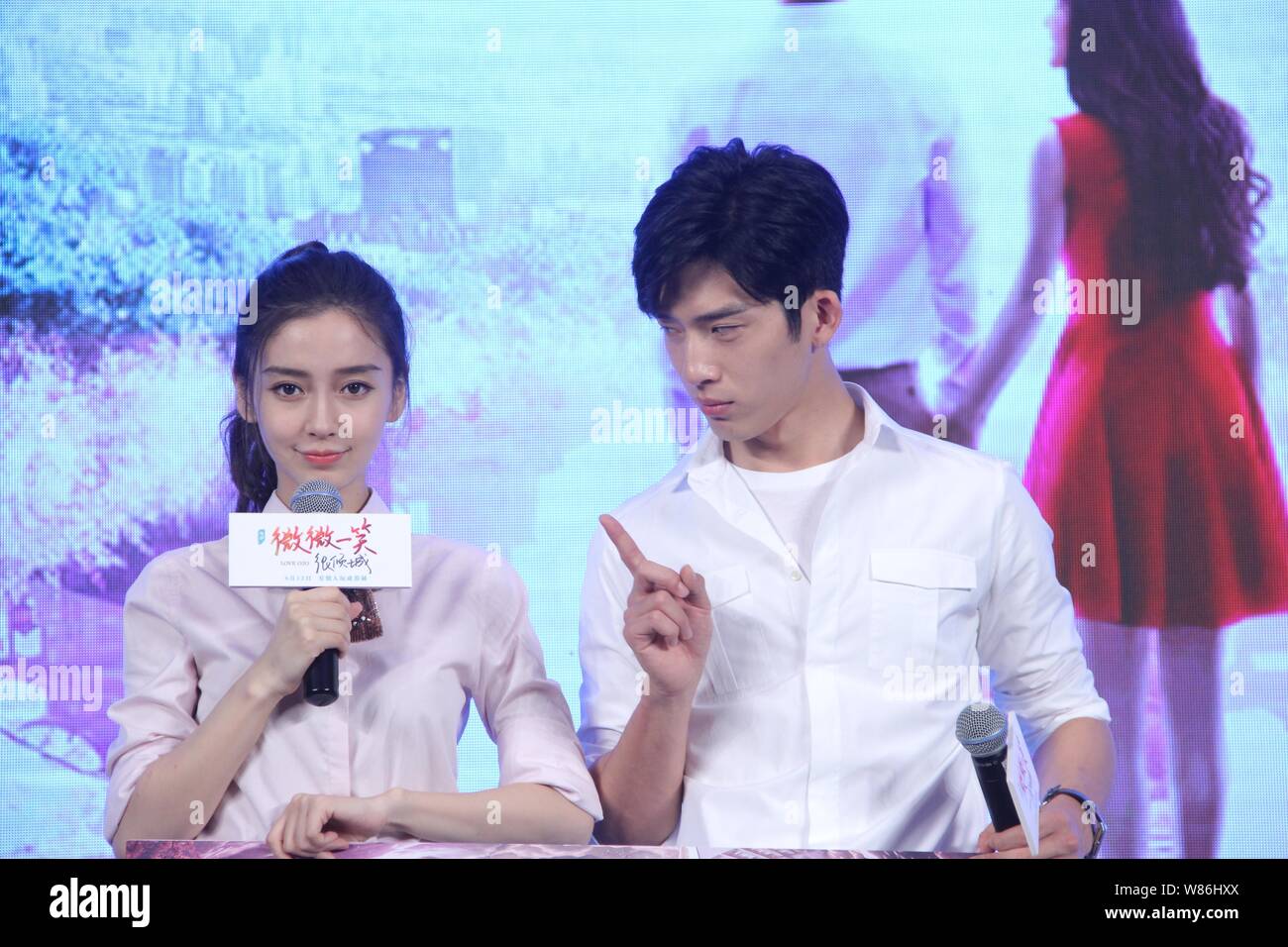 Hong Kong model and actress Angelababy, left, and Chinese actor Jing ...