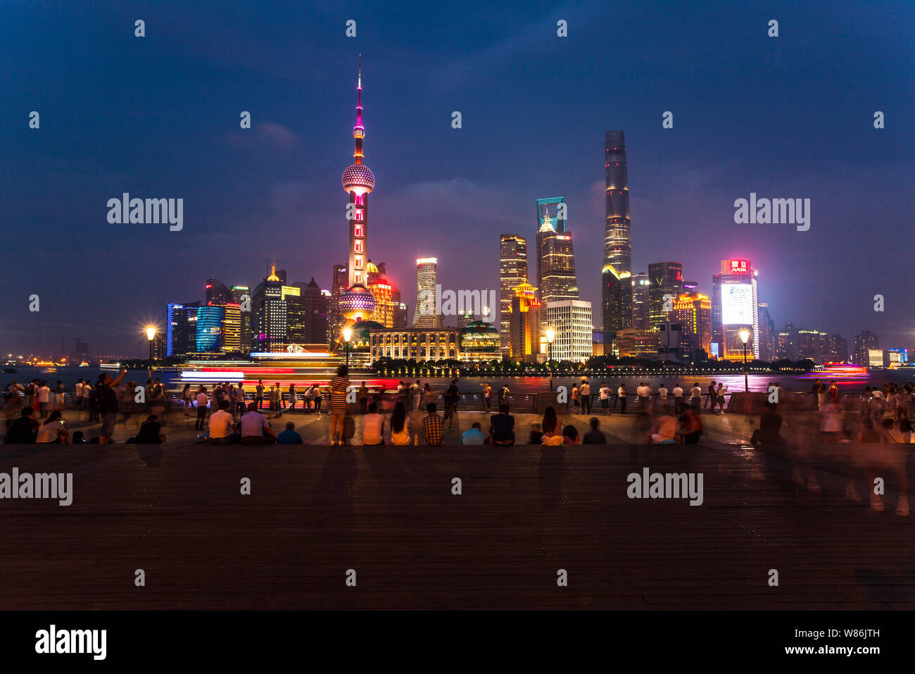 This photo taken from the promenade on the Bund in Puxi shows a night ...